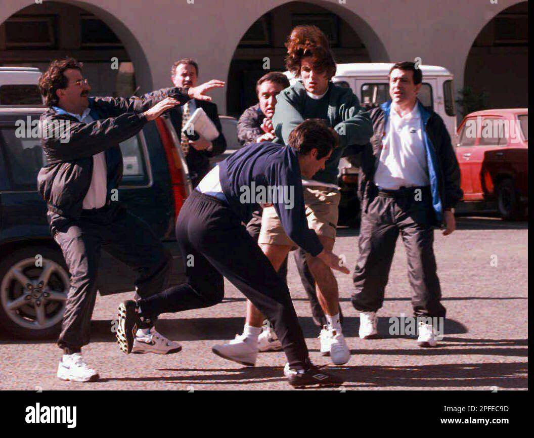 Sporting's striker Ricardo Sa Pinto (center) punches national assistant ...