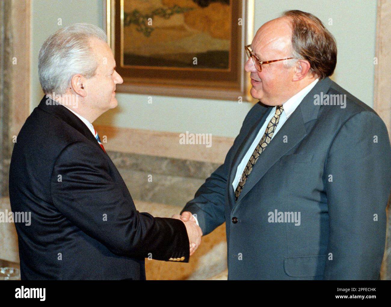 Serbian President Slobodan Milosevic ,left,shakes hands with Greek ...
