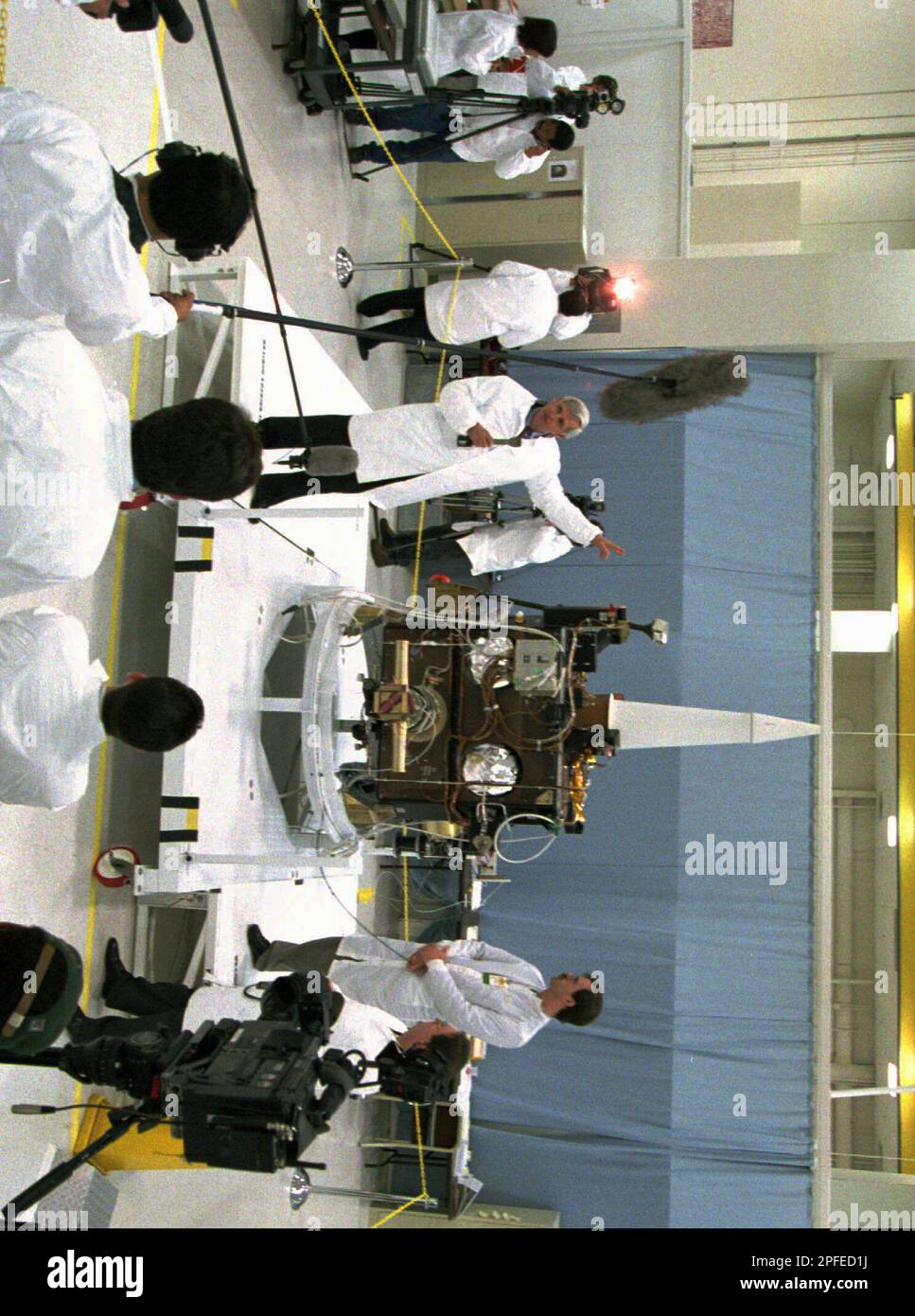 Alan Binder, principal investigator for Lockheed Martin, shows off NASA ...