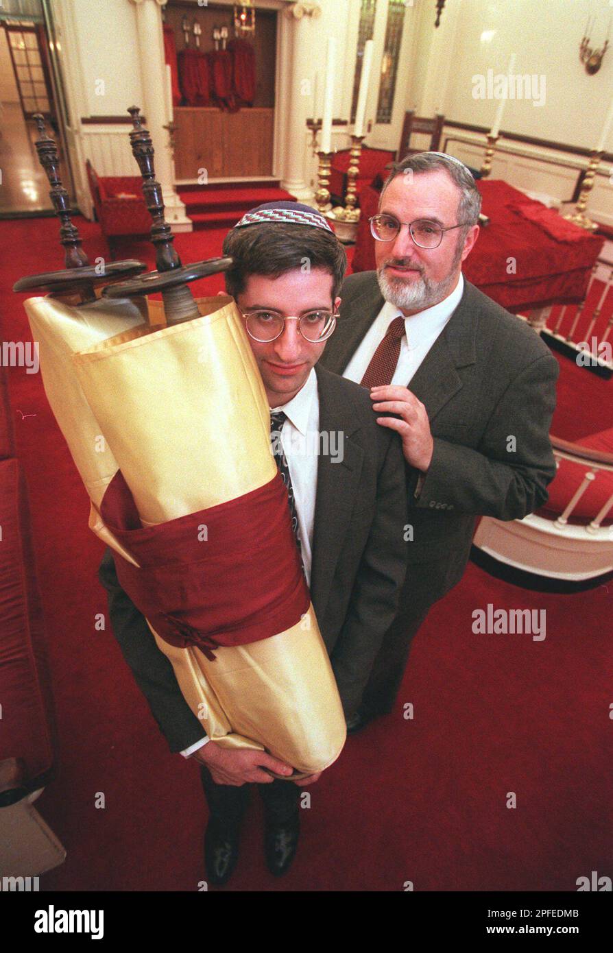 Rabbi Hayyim Angel, holding a Torah dating back to the American ...