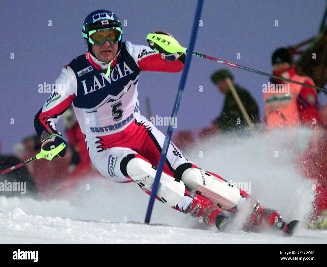 Thomas Stangassinger of Austria powers past a gate during the 1st run ...