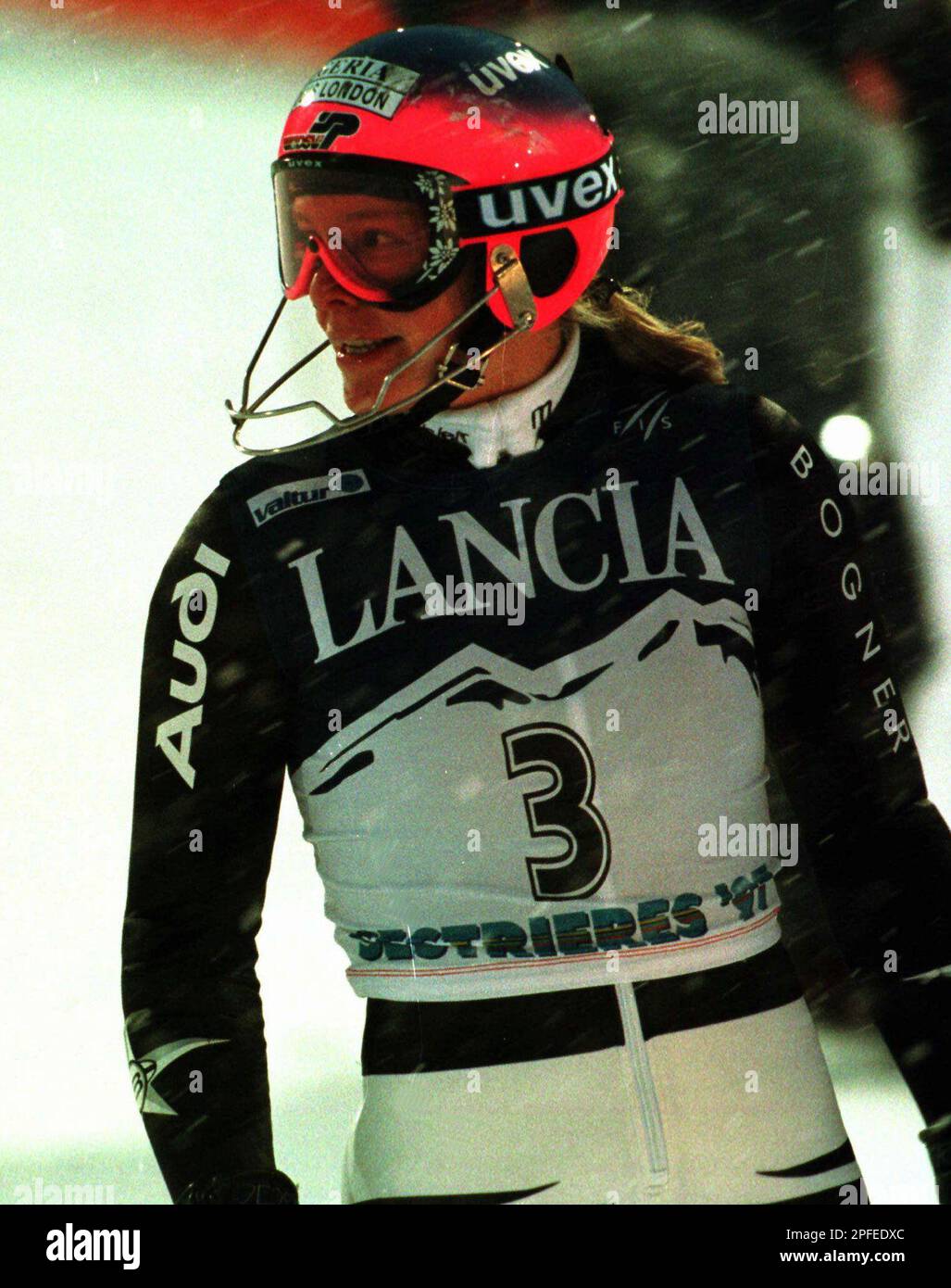 Katja Seizinger of Germany looks at he scoreboard after completing the ...