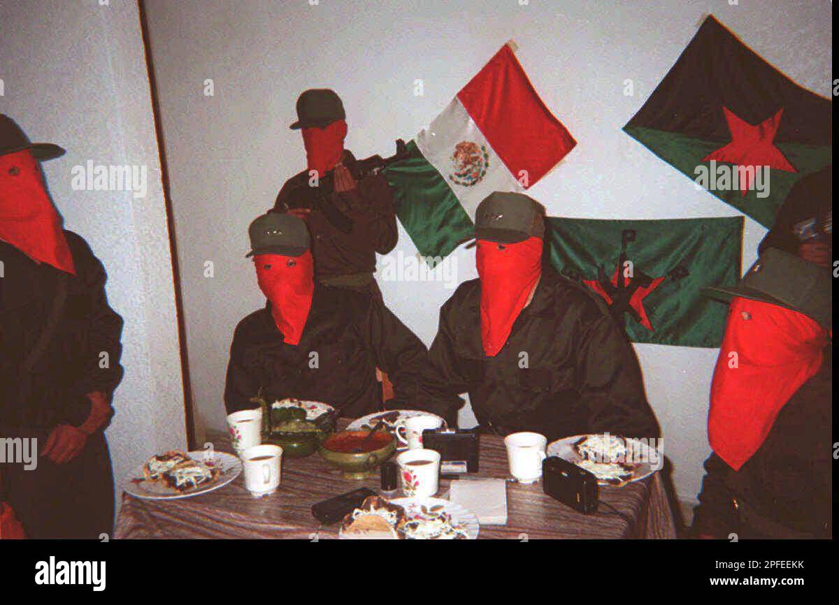 Members of Mexico's Popular Revolutionary Army (EPR) hold a news ...