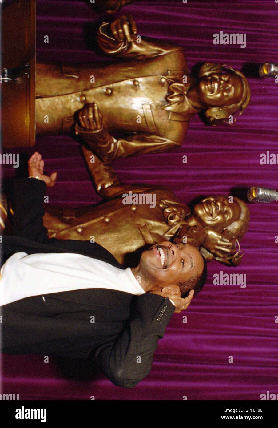 Bubba Knight, of Gladys Knight and the Pips, reacts as he stands next ...