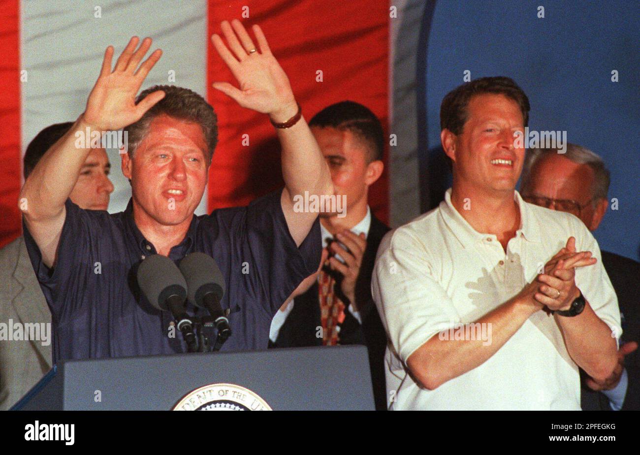 With arms in the air, President Clinton and Vice Presdient Al Gore ...