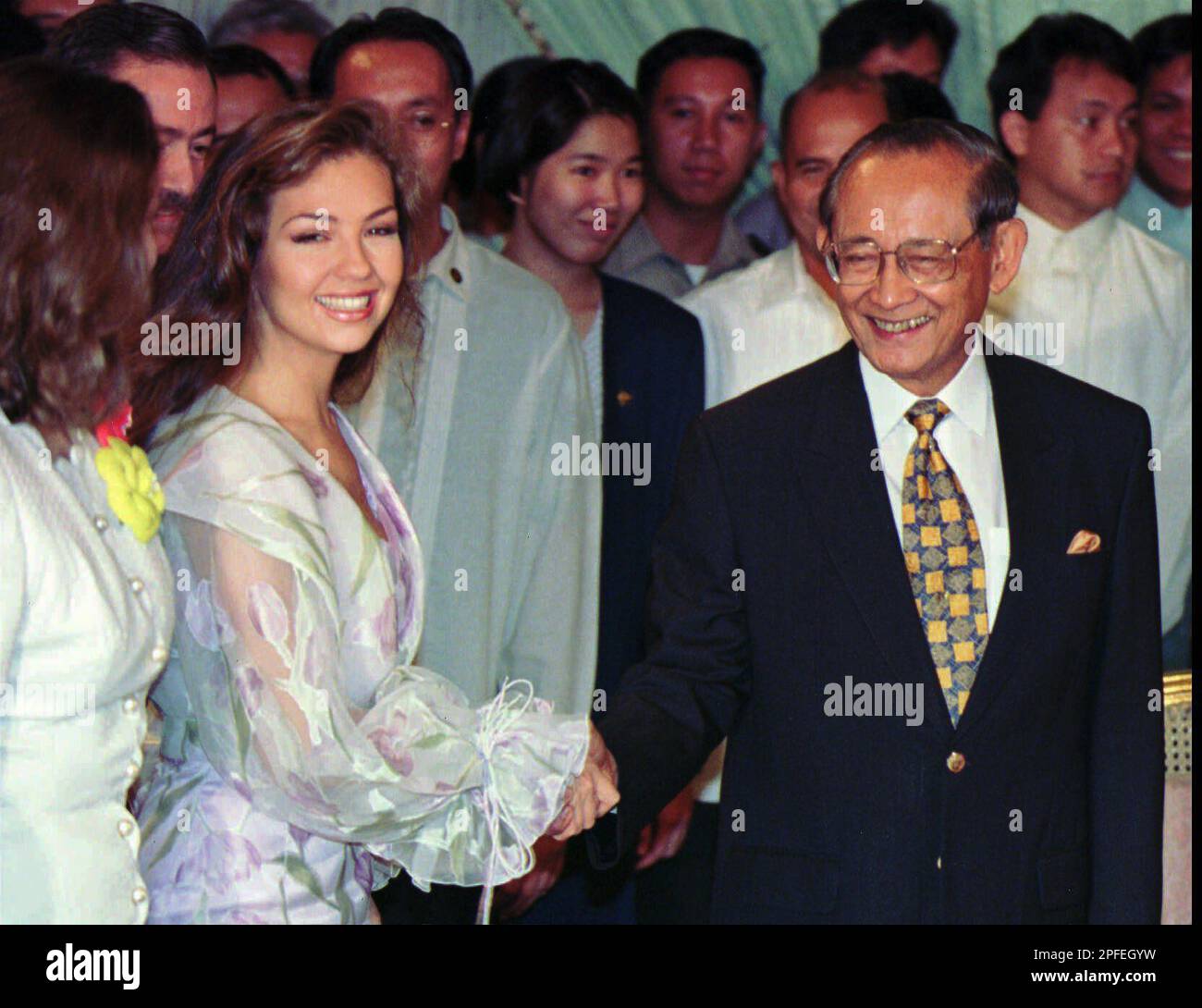 Philippines President Fidel Ramos, right, greets Mexican TV soap opera actress, Thalia, on ...