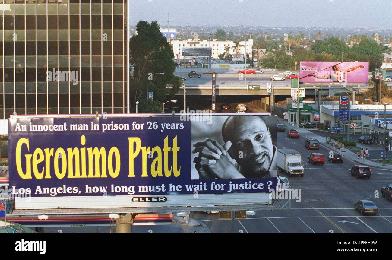The Los Angeles driving public passes a billboard of jailed former ...