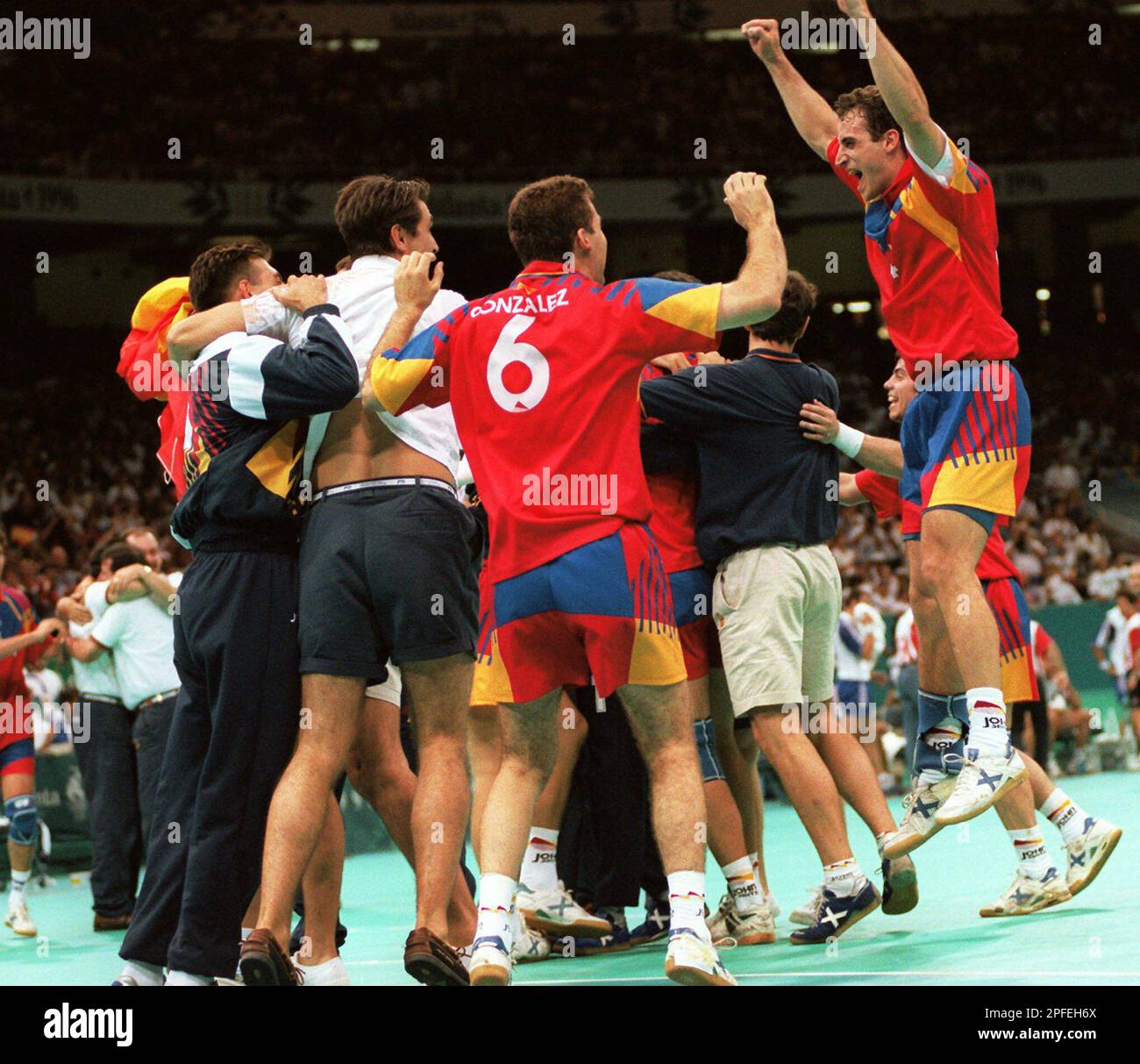 Spain's handball team celebrates their 27-25 victory over France to win ...