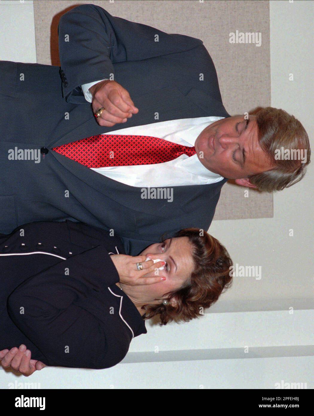 Former Alabama Gov. Jim Folsom Jr. comforts his wife Marsha who started ...