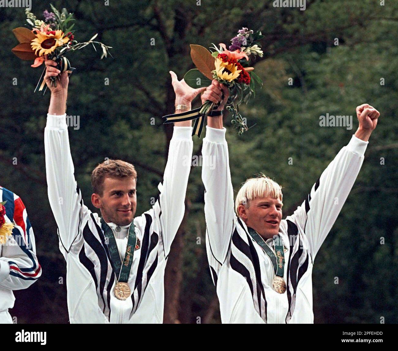 Michael Senft, left, and teammate Andre Ehrenberg of Germany celebrate ...