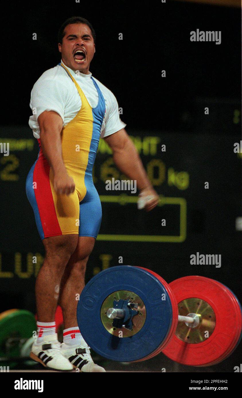 Venezuela's Julio Luna celebrates a 165kg snatch lift he made on his ...