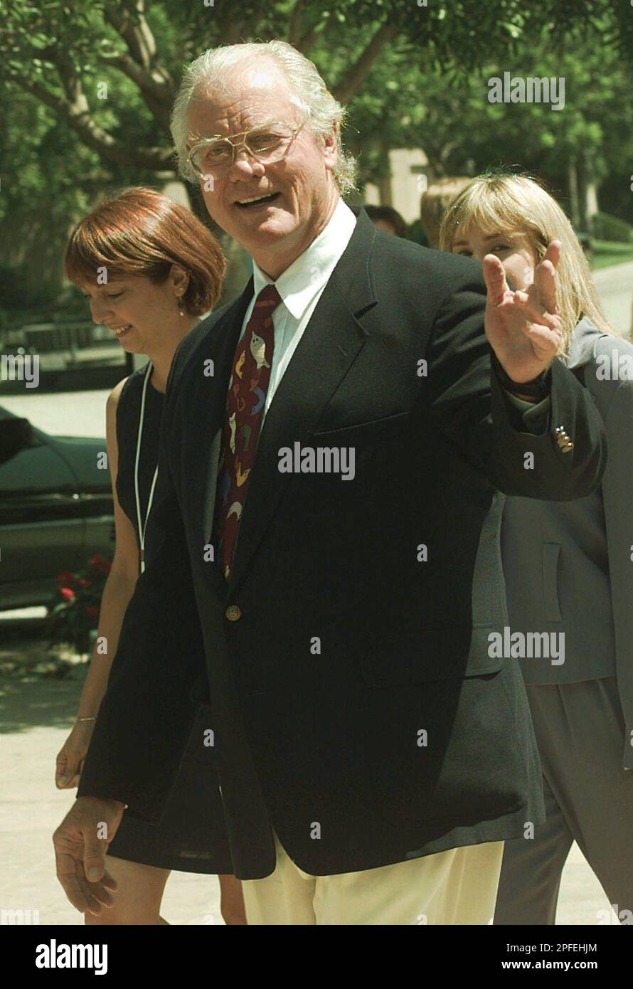 Actor Larry Hagman, J.R. Ewing of "Dallas: J.R. Returns," waves to ...