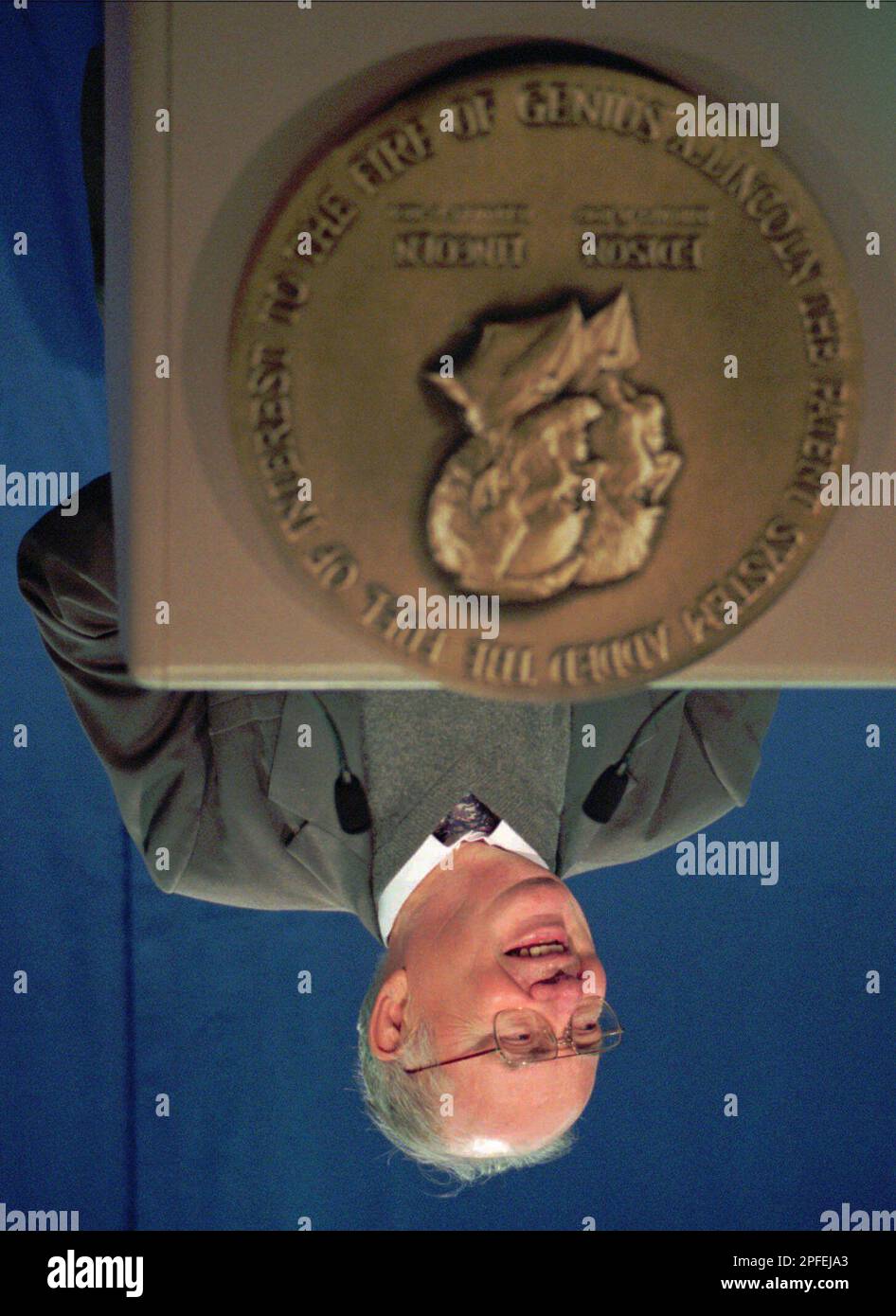 Stanford University professor Arthur Schawlow smiles during a ceremony ...