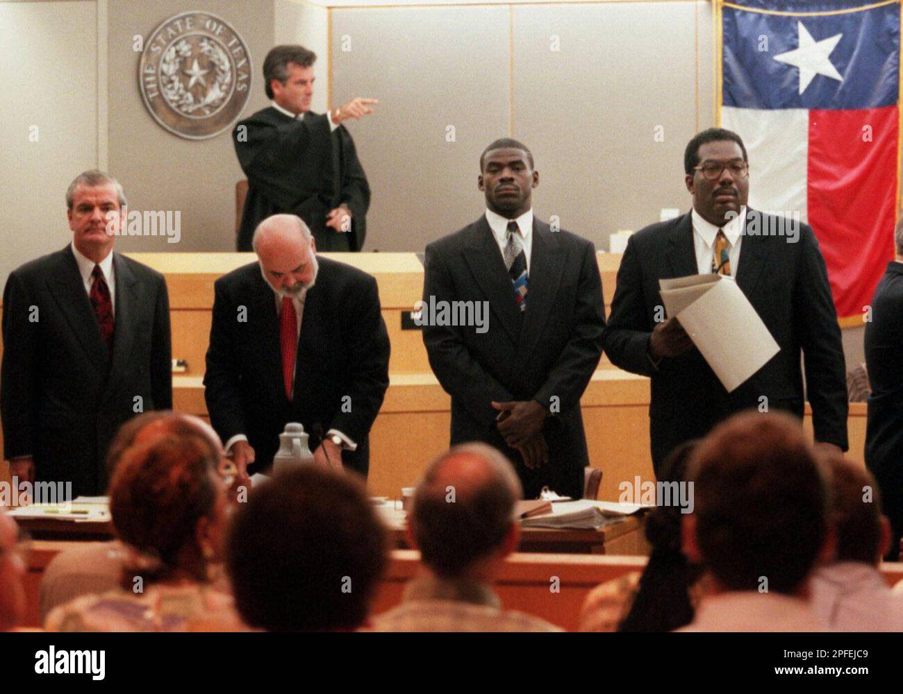 Michael Irvin, second from right, faces potential jurors as State ...