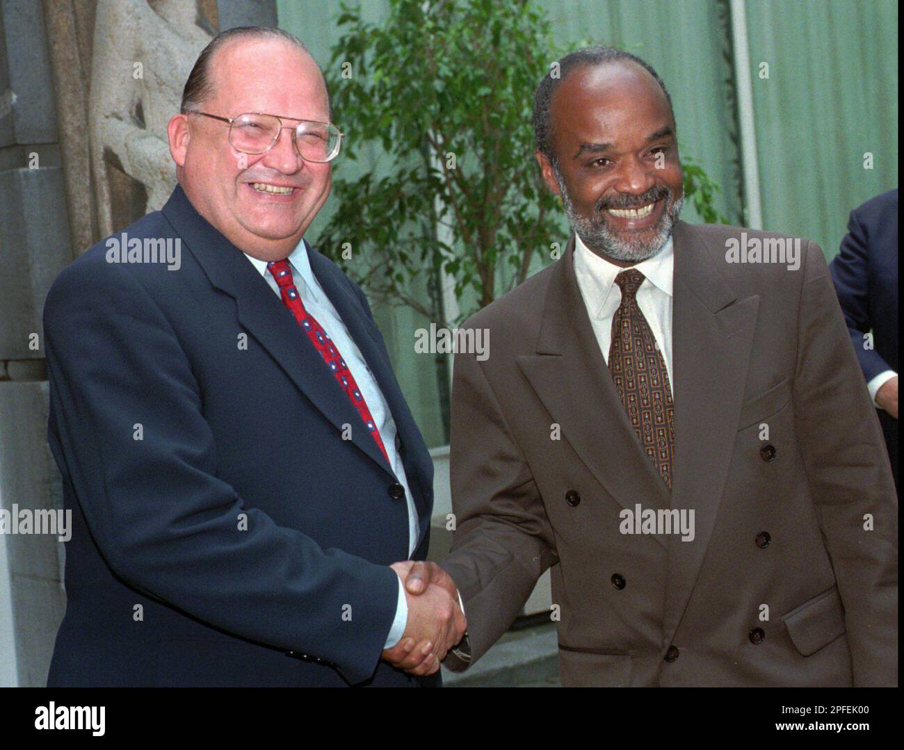 Belgian Prime Minister Jean Luc Dehaene, left greets Haiti president ...