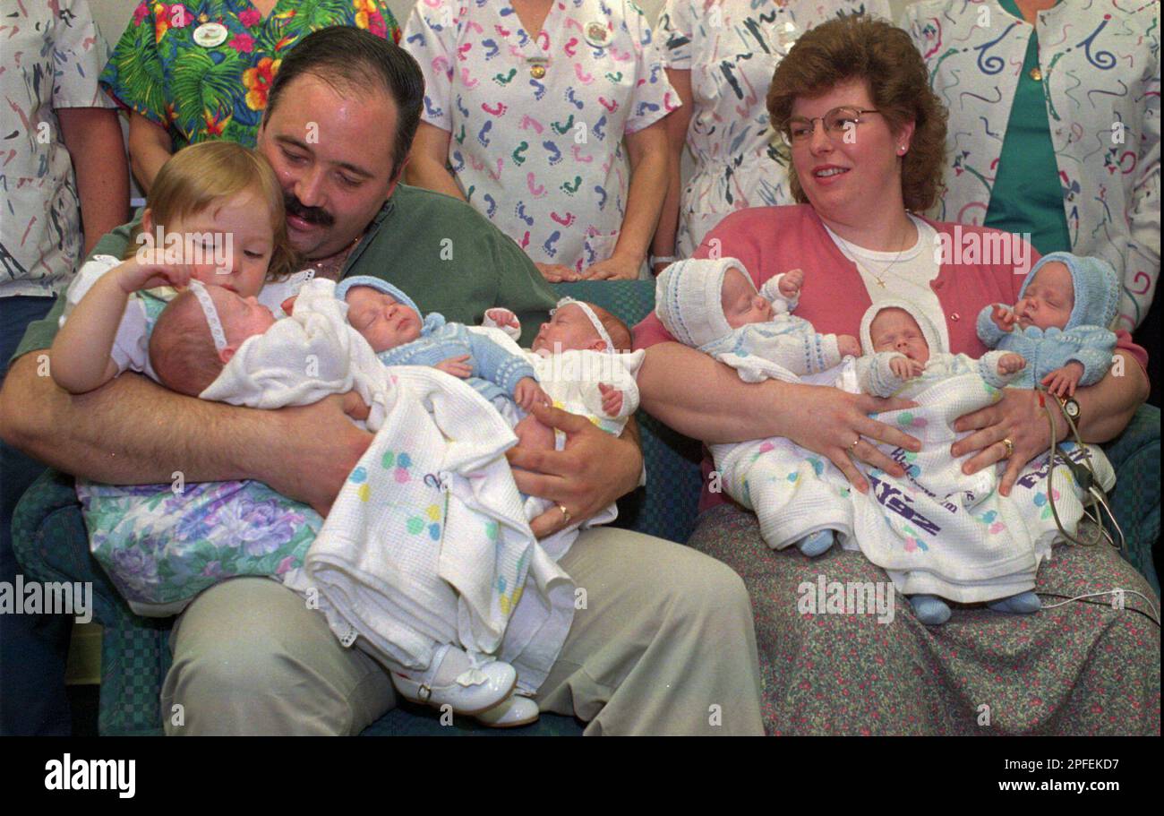 Norman and Michelle Haner hold their seven children at St. Peter's ...