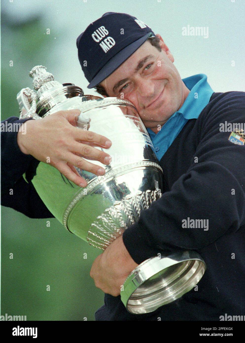 Costantino Rocca of Italy hugs the trophy after winning the PGA ...
