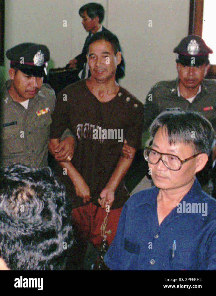 Thai police escort Yoshimi Tanaka, center, former Japanese Red Army ...