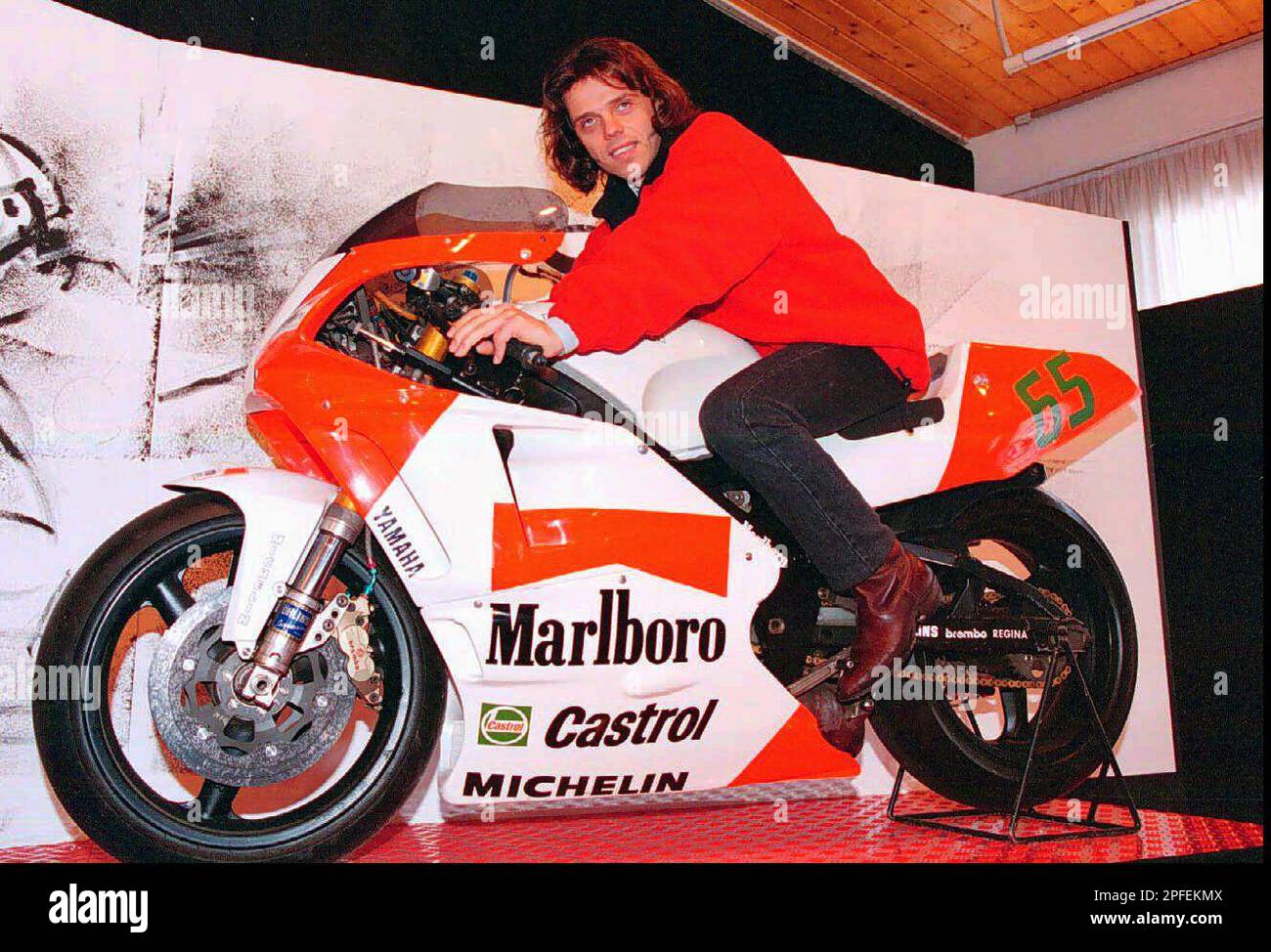 Italian motorbike champion Loris Capirossi sits on a 500-cc Yamaha ...