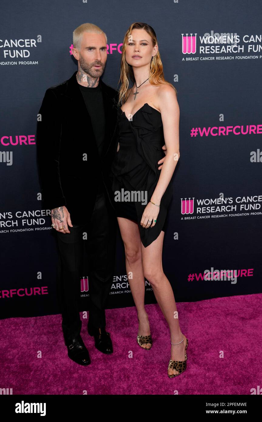 Adam Levine and his wife Behati Prinsloo pose together at "An ...