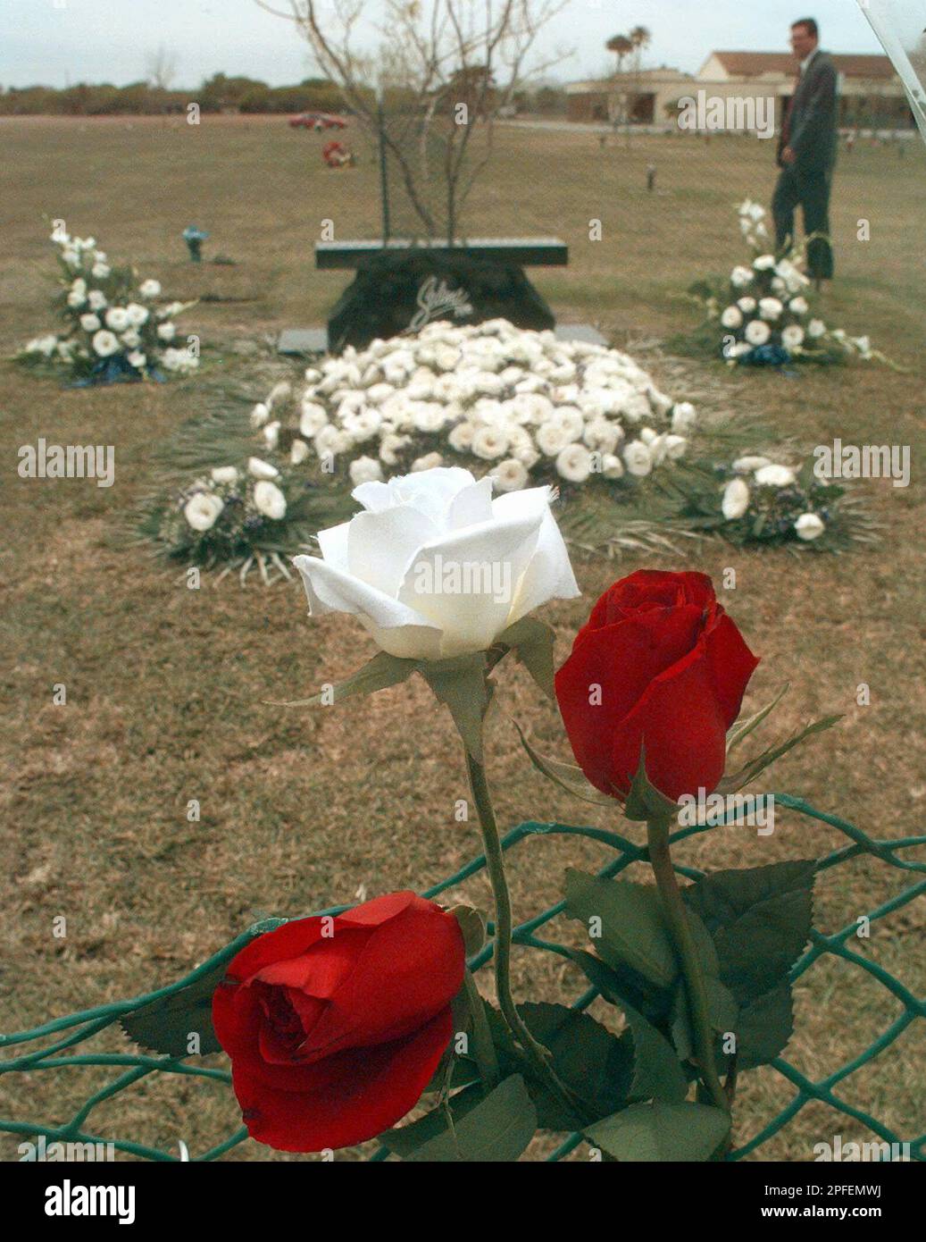 Visitors to the grave of slain Tejano music star Selena leave various ...