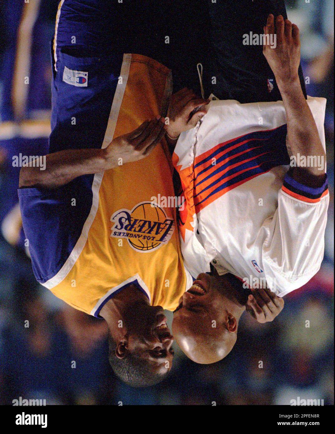Phoenix Suns' Charles Barkley, left, and Los Angeles Lakers' Earvin ...