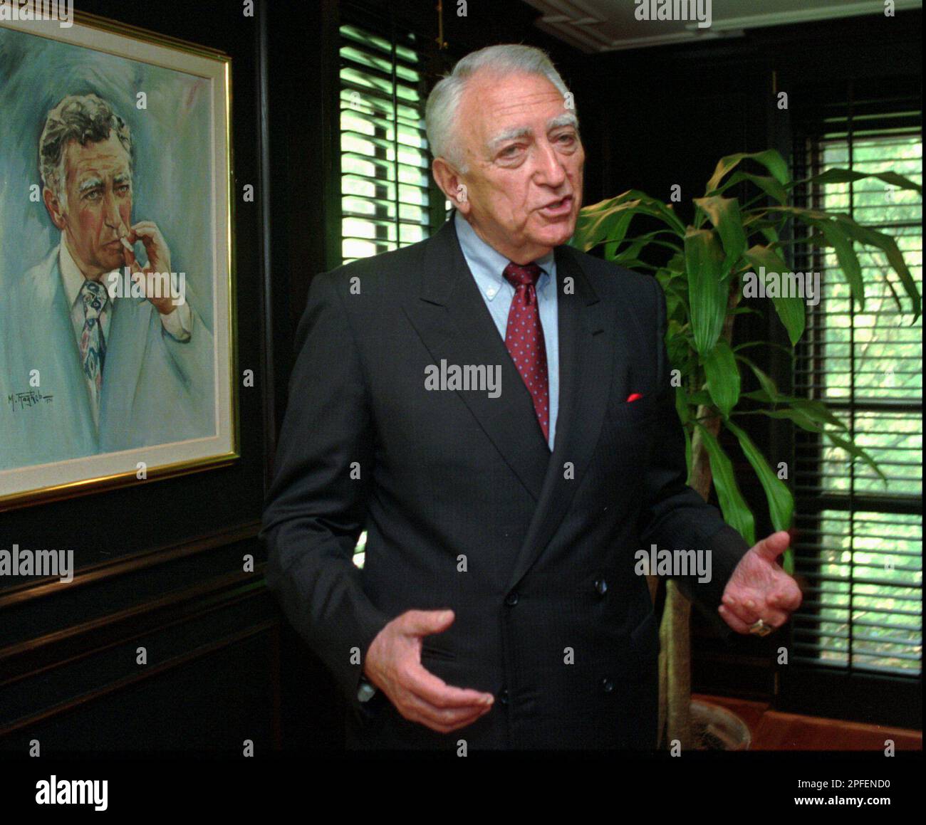 Former Philadelphia Eagles owner Leonard Tose stands in front of a ...