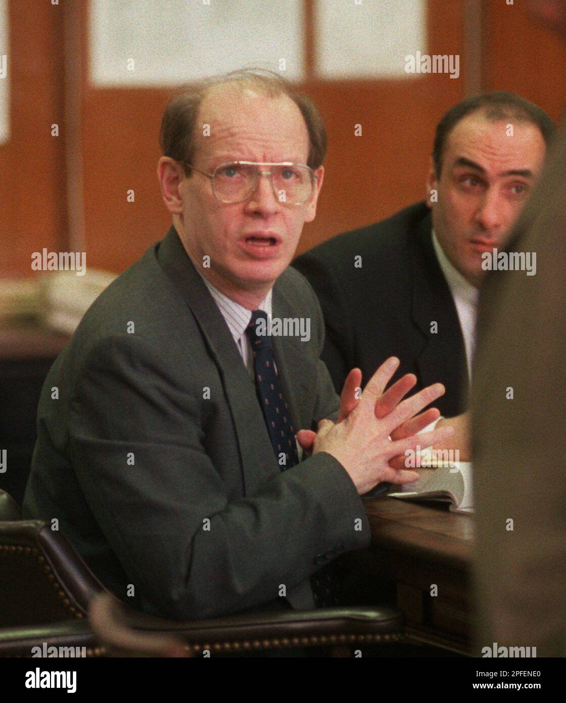 Accused subway firebomber Edward Leary looks on from the defense table ...
