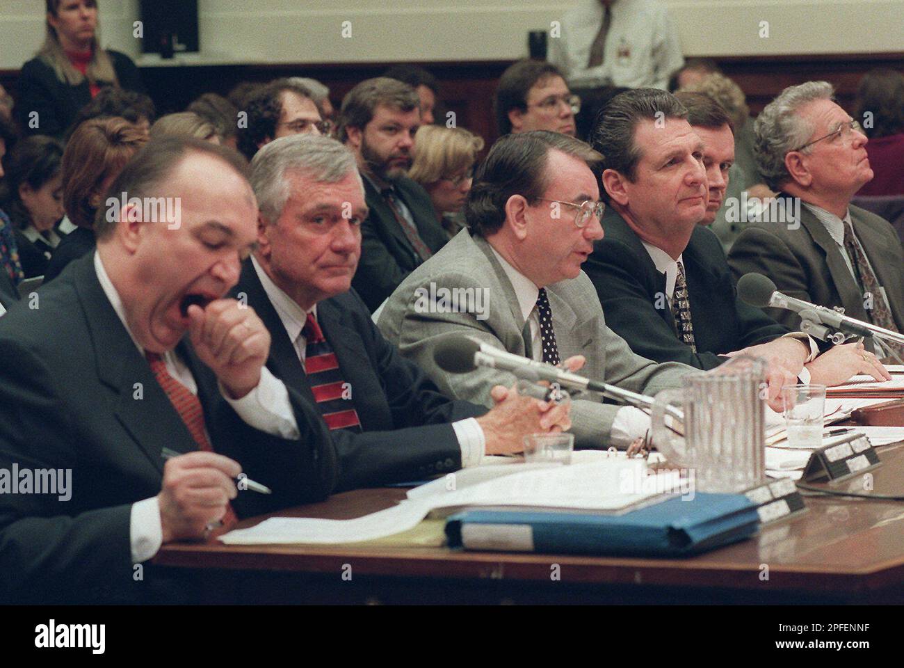 Michigan Gov. John Engler, left, yawns as he and fellow governors ...