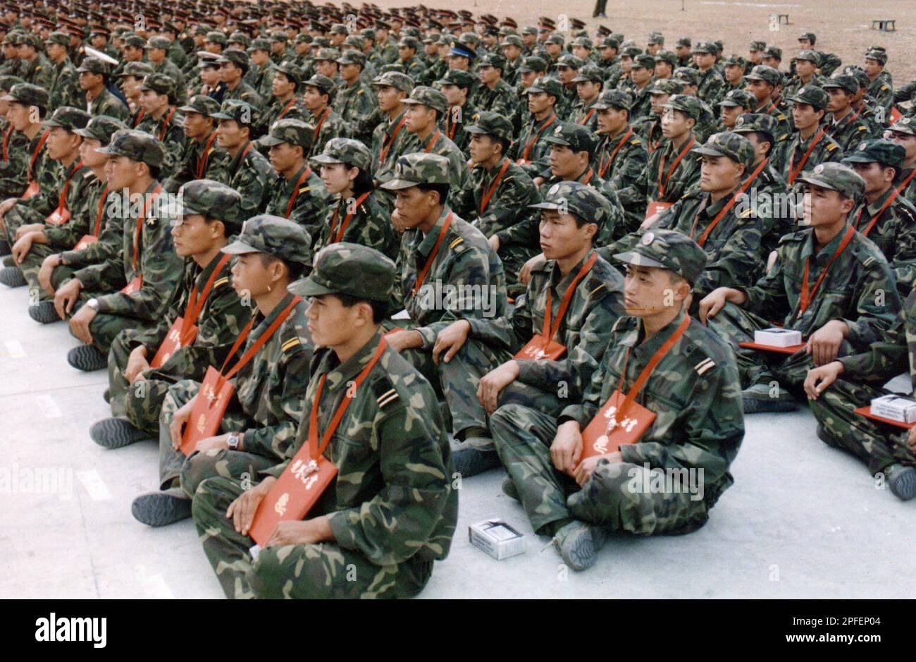 FILE--Soldiers and officers of the military forces of the Chinese ...