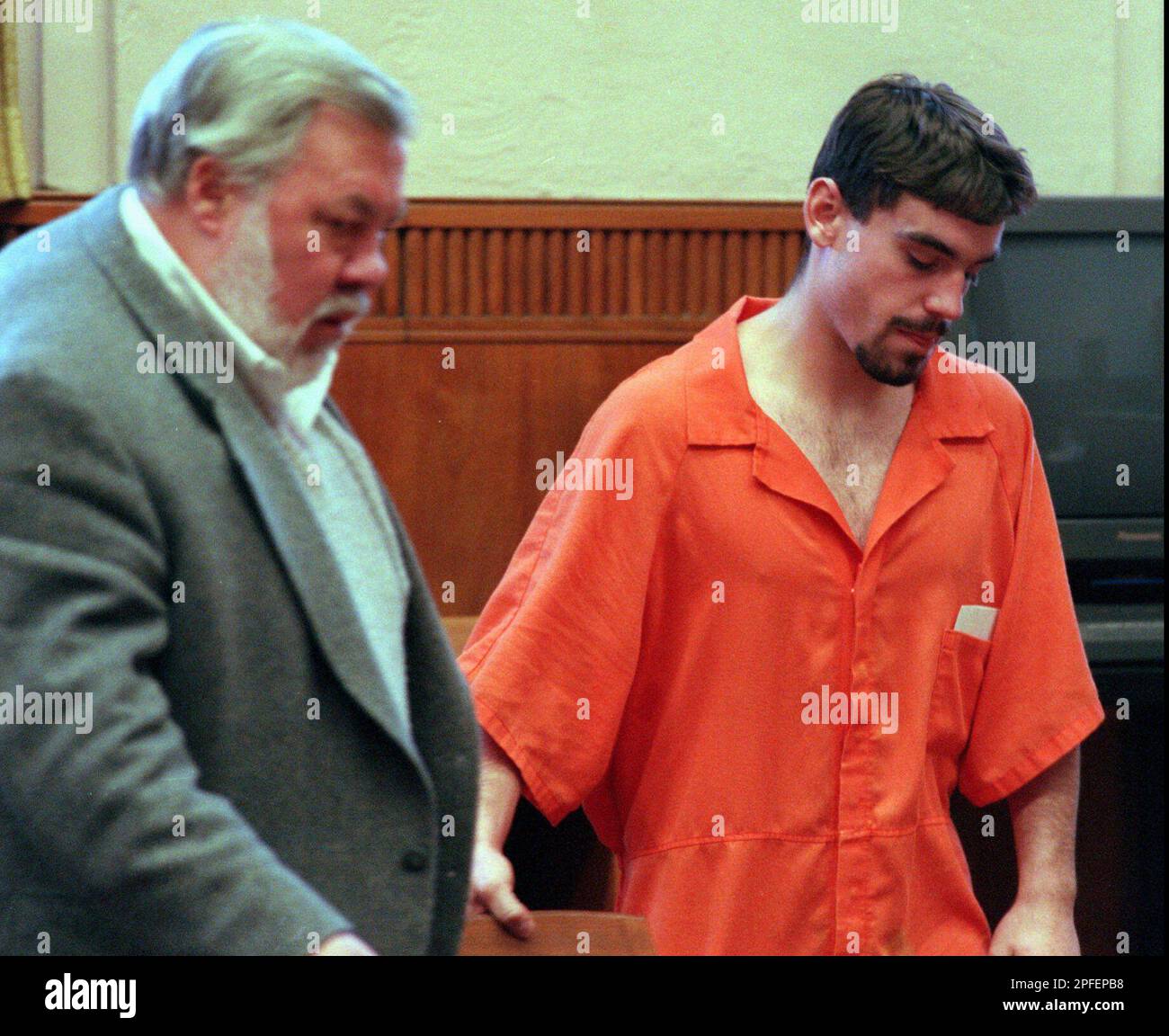 Travis Jamieson, right, takes a seat Thursday, Feb. 1, 1996, at his initial appearance at the ...