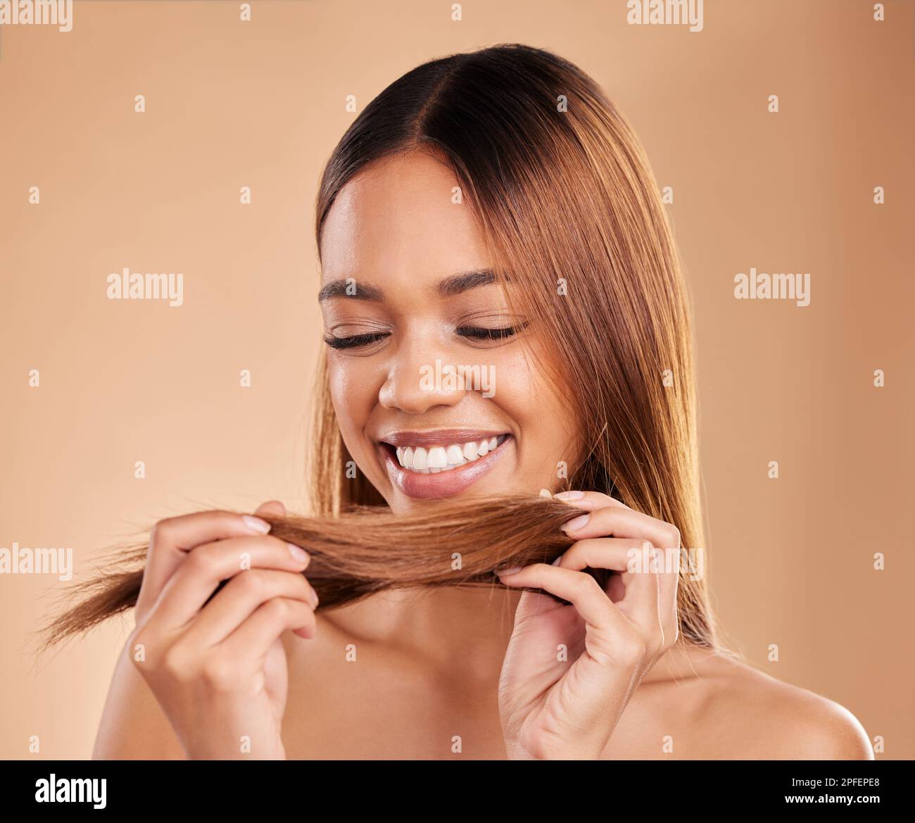 Woman, beauty and hair care with a smile for growth, texture and shine ...