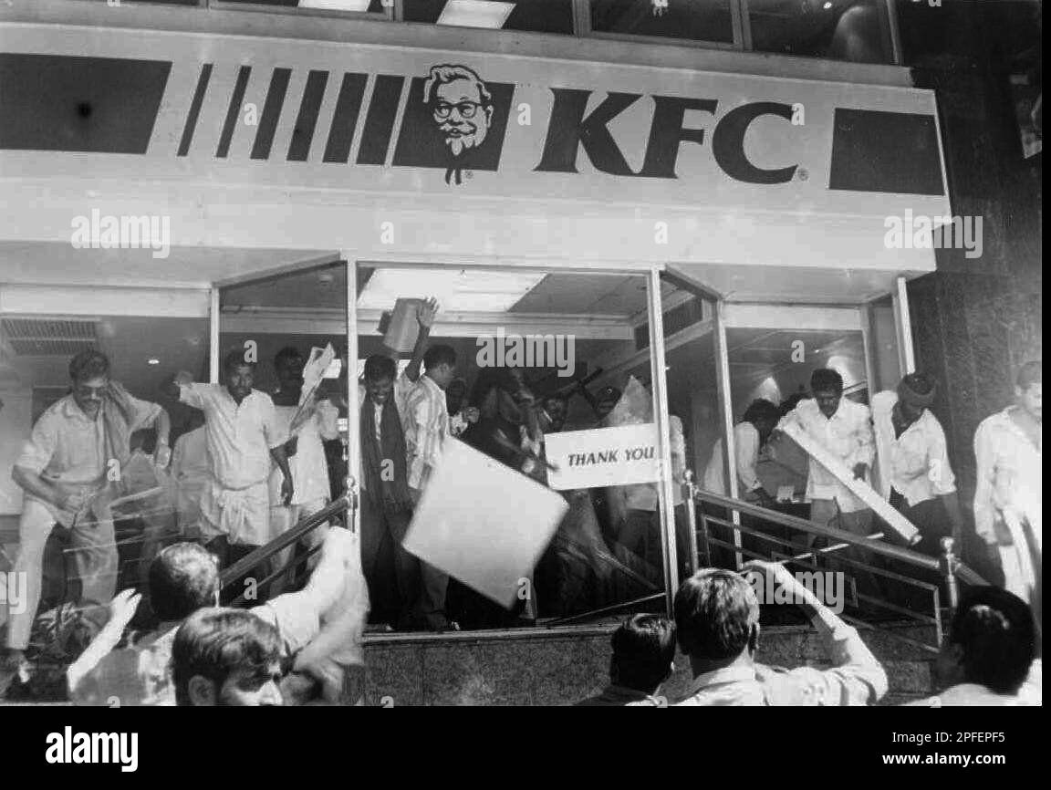 Nearly 100 farmers ransacking the Kentucky Fried Chicken outlet in the ...