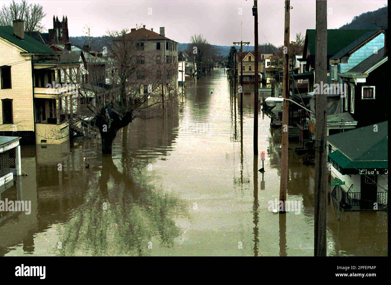 Water fills this street on Wheeling Island in the Ohio River as flood ...