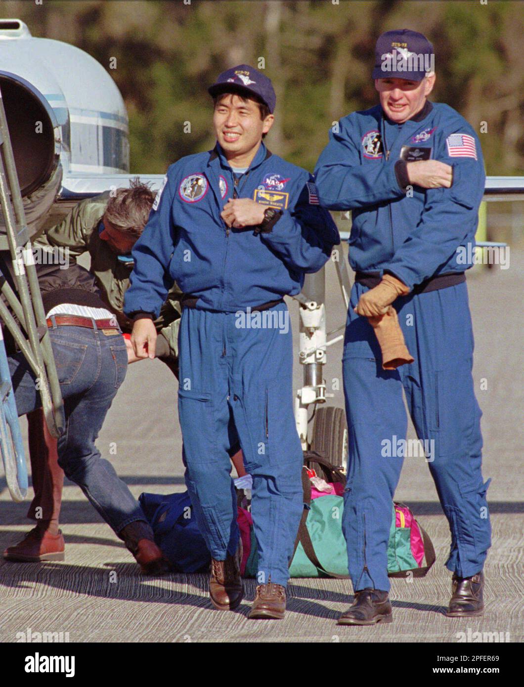 STS-72 Commander Brian Duffy, from Boston, Mass., right, and Japanese Payload Specialist Koichi ...