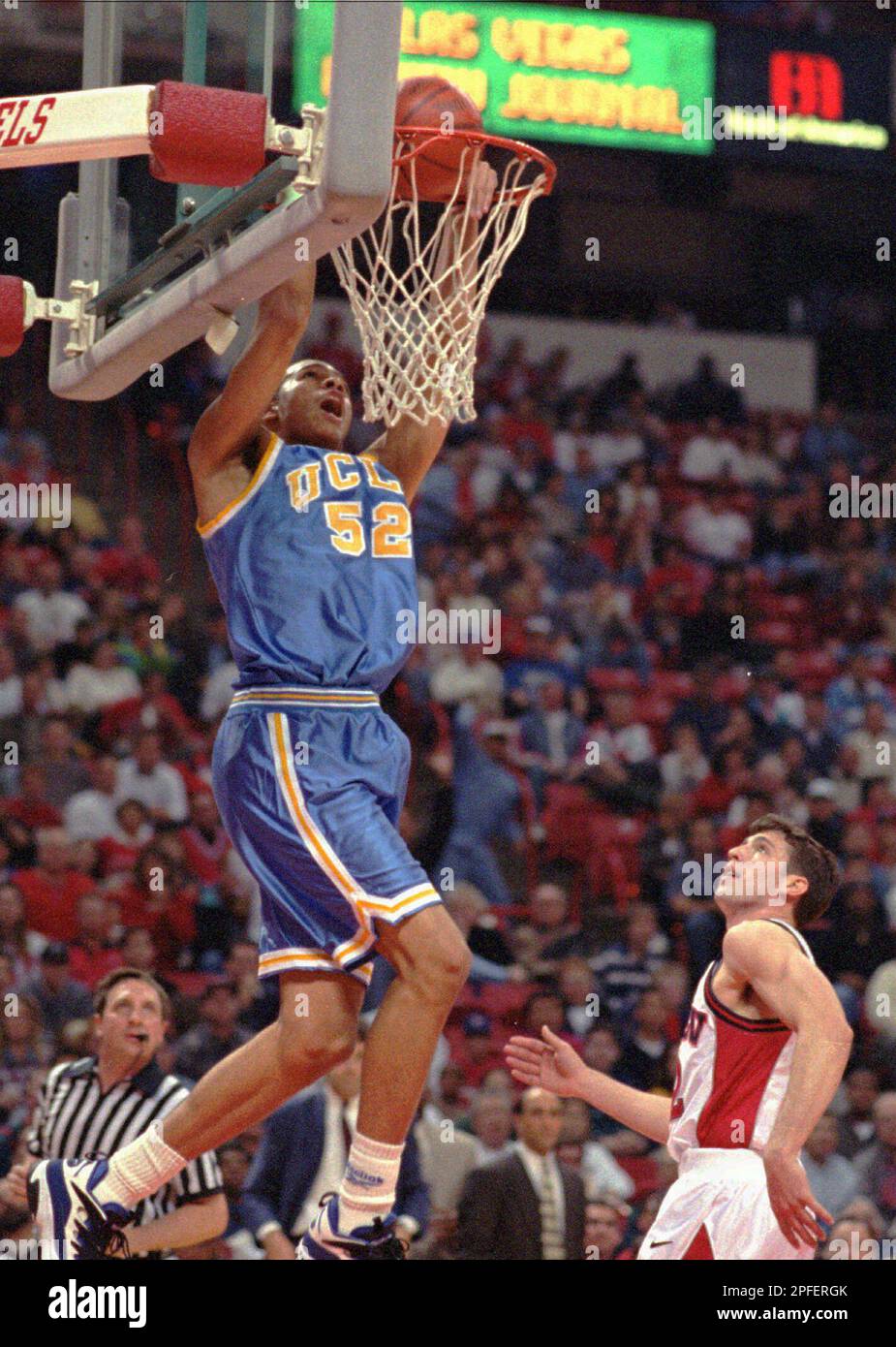UCLA forward J.R. Henderson (52) slams for two of his season-high 25 ...
