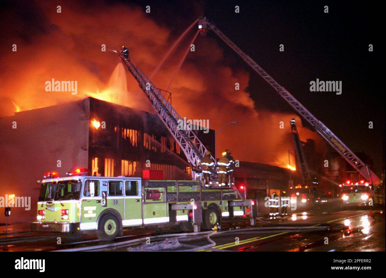 More than 100 firefighters and 30 trucks battle a five-alarm blaze ...