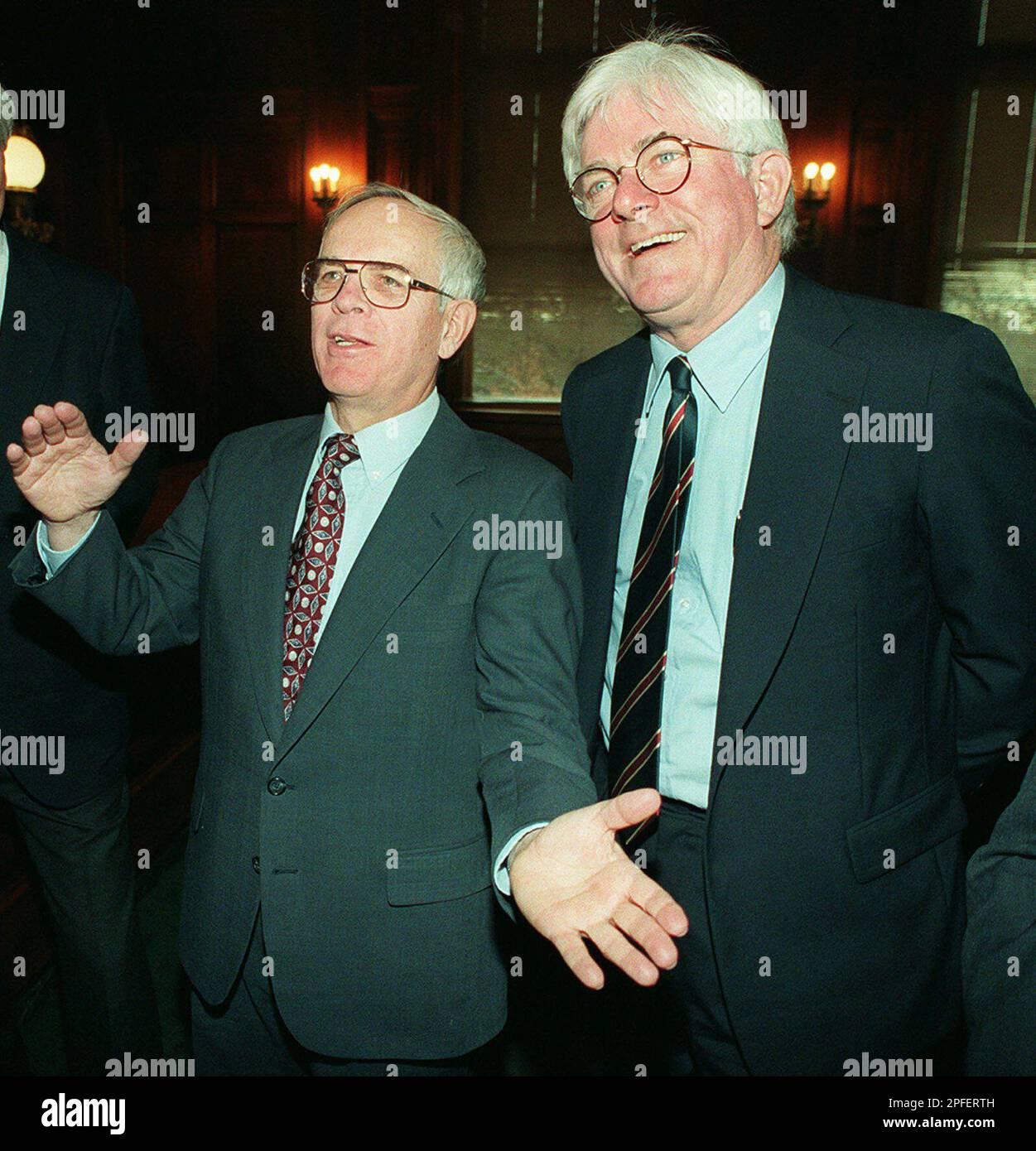 Kentucky Supreme Court Justice Bill Graves, left, shares a laugh with ...