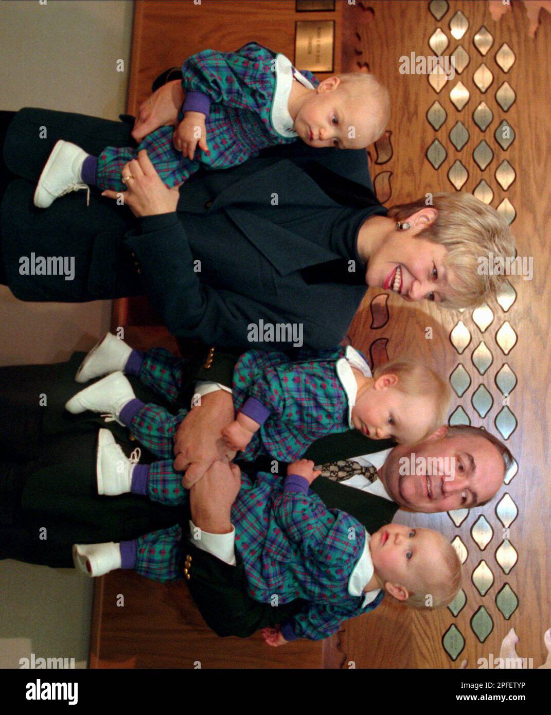 Gov. John Engler and wife Michelle pose with their triplets during a ...