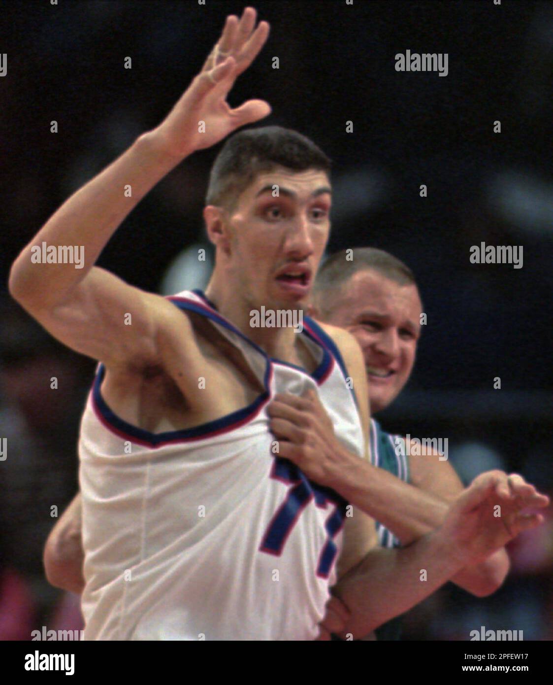 Charlotte Hornets George Zidek, right, battles Washington Bullets ...