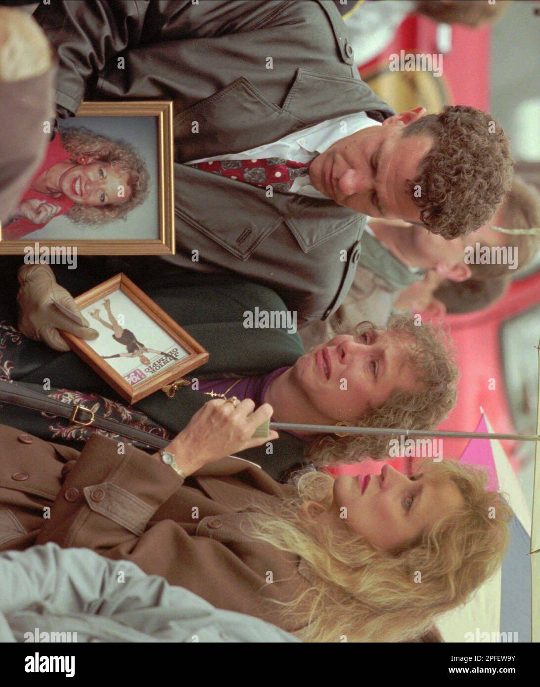 Michael Hanisch, left, Jan Meyer, center, and Donna Zeh, mourn the loss ...