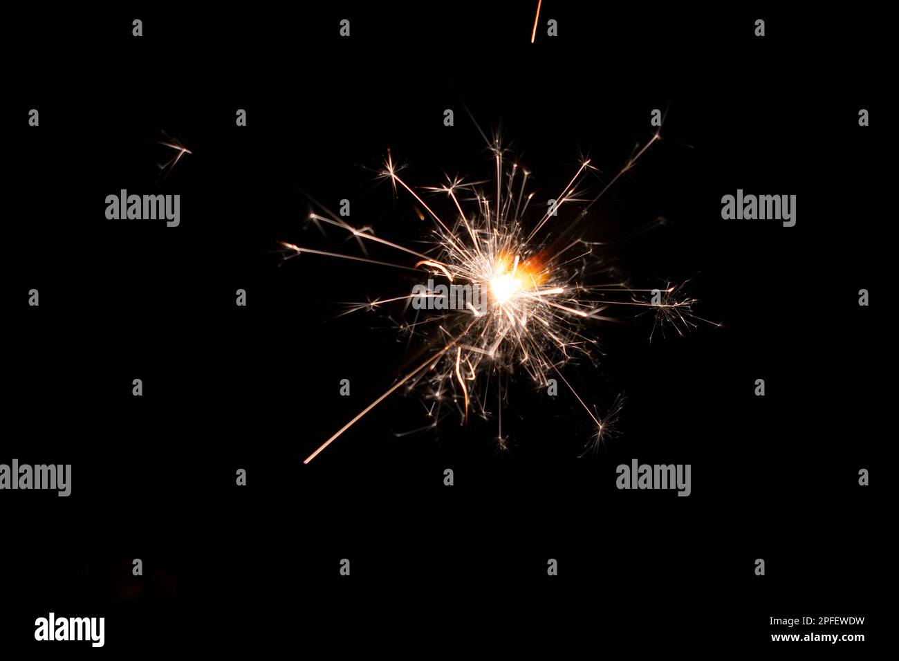 Beautiful shapes resulting from burning firecrackers in the darkness of ...