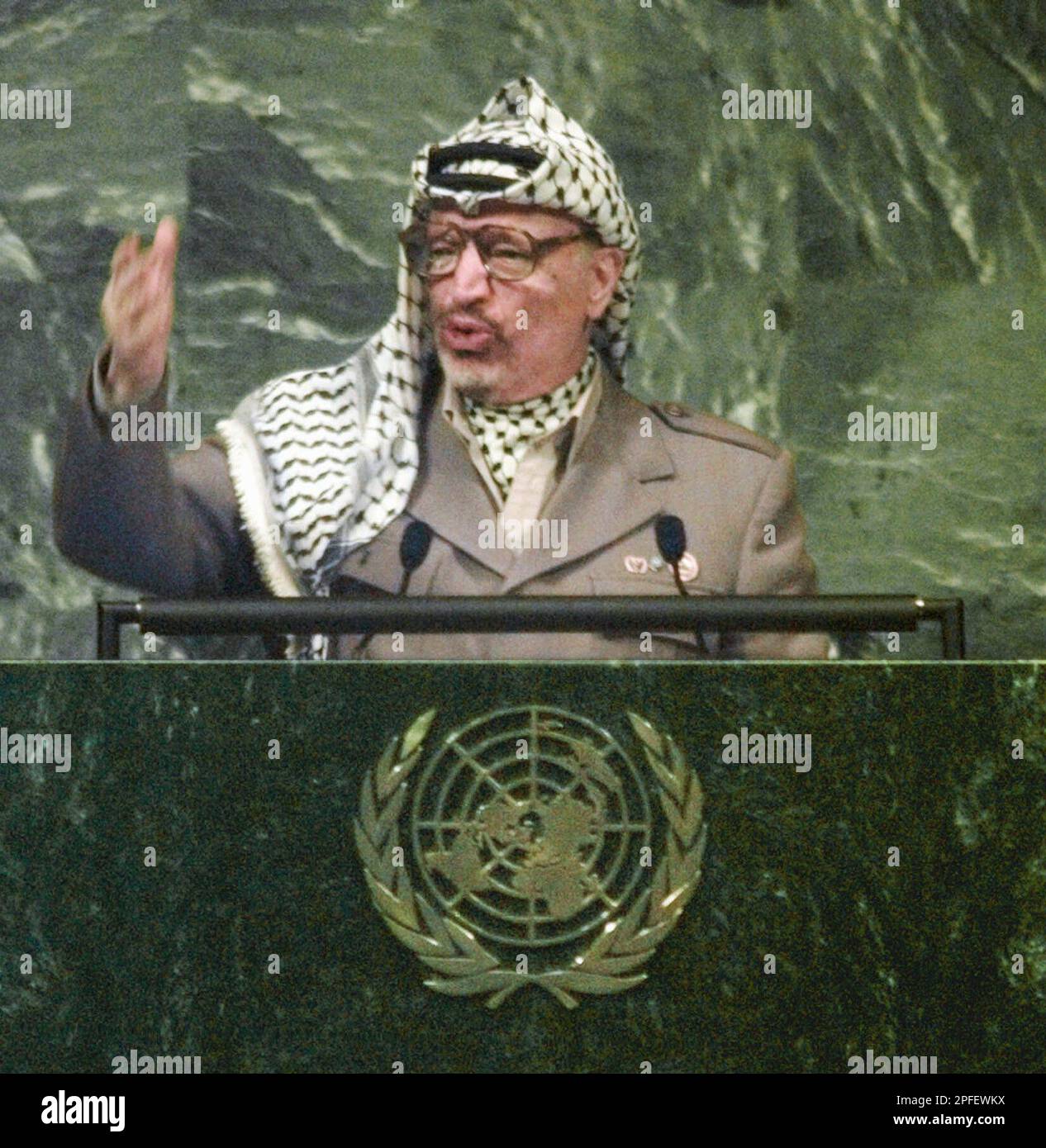 PLO Chairman Yasser Arafat addresses the U.N. General Assembly at a ...