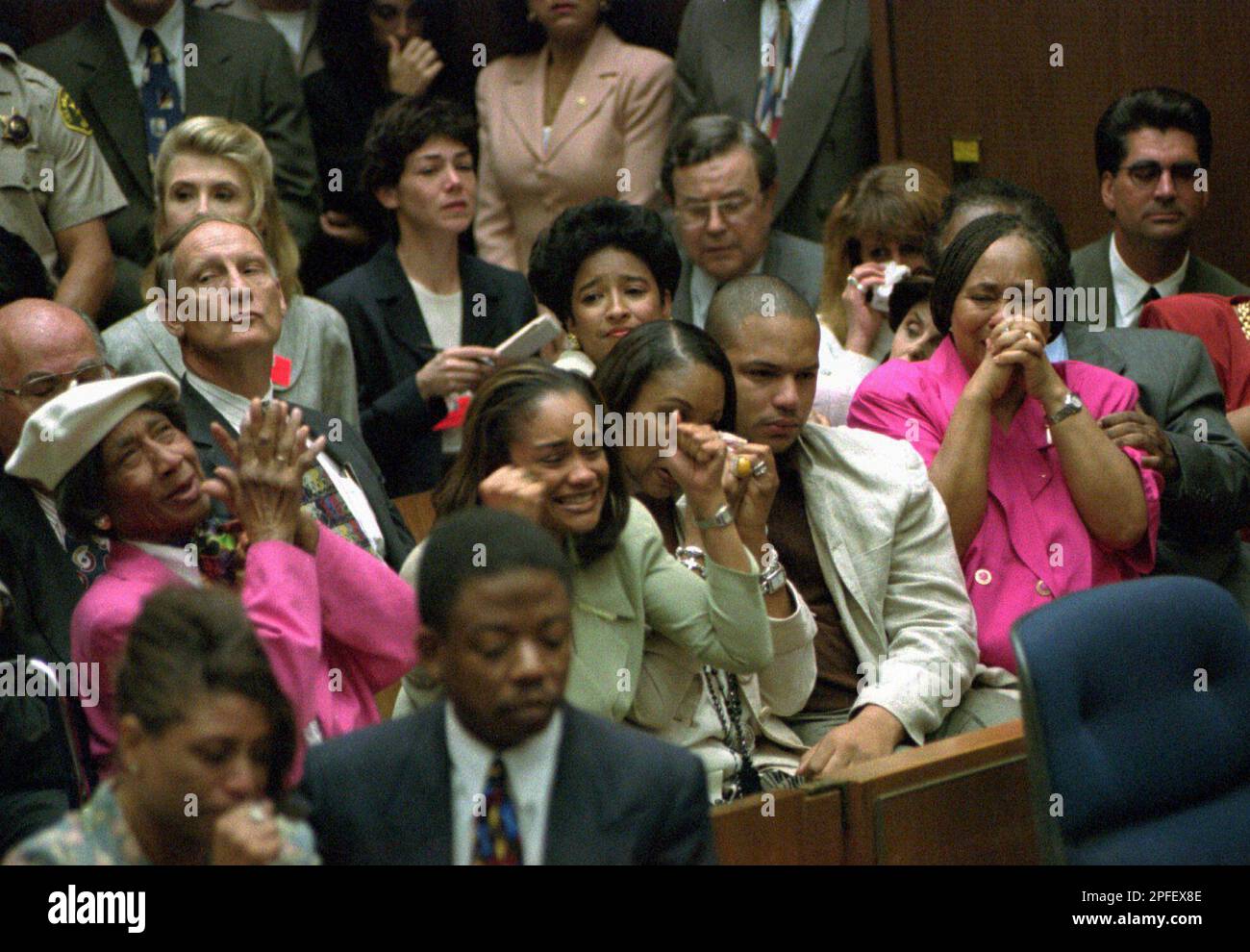 Members of O.J. Simpson's family react as the not guilty verdict is ...