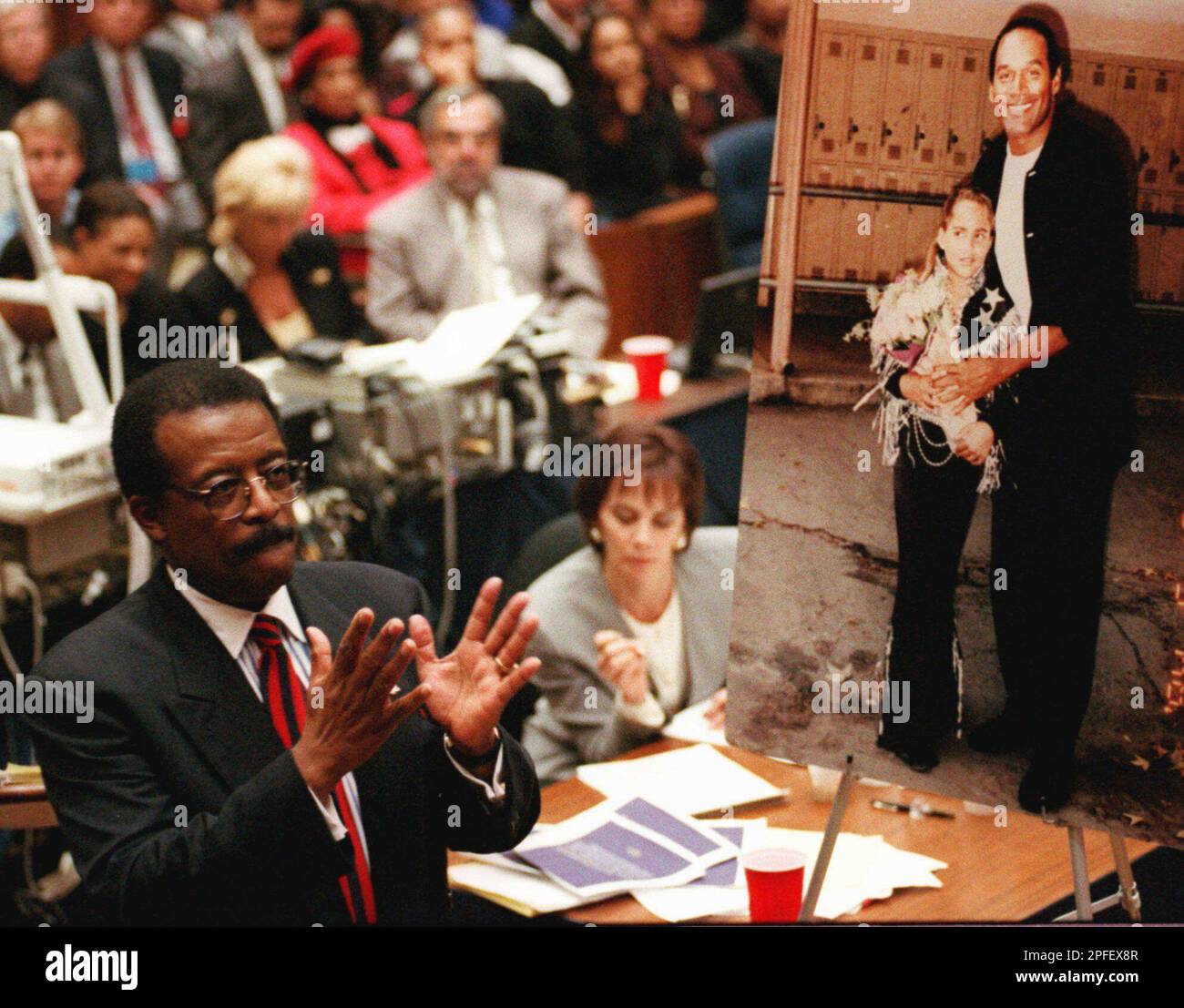 Defense attorney Johnnie Cochran gestures while presenting closing ...