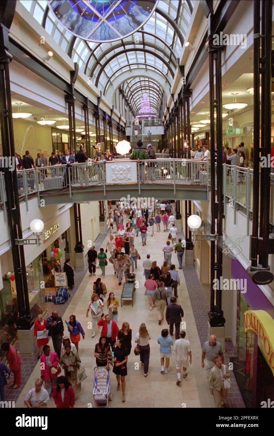 Shoppers stroll the main concourse of the Circle Centre Mall after the ...