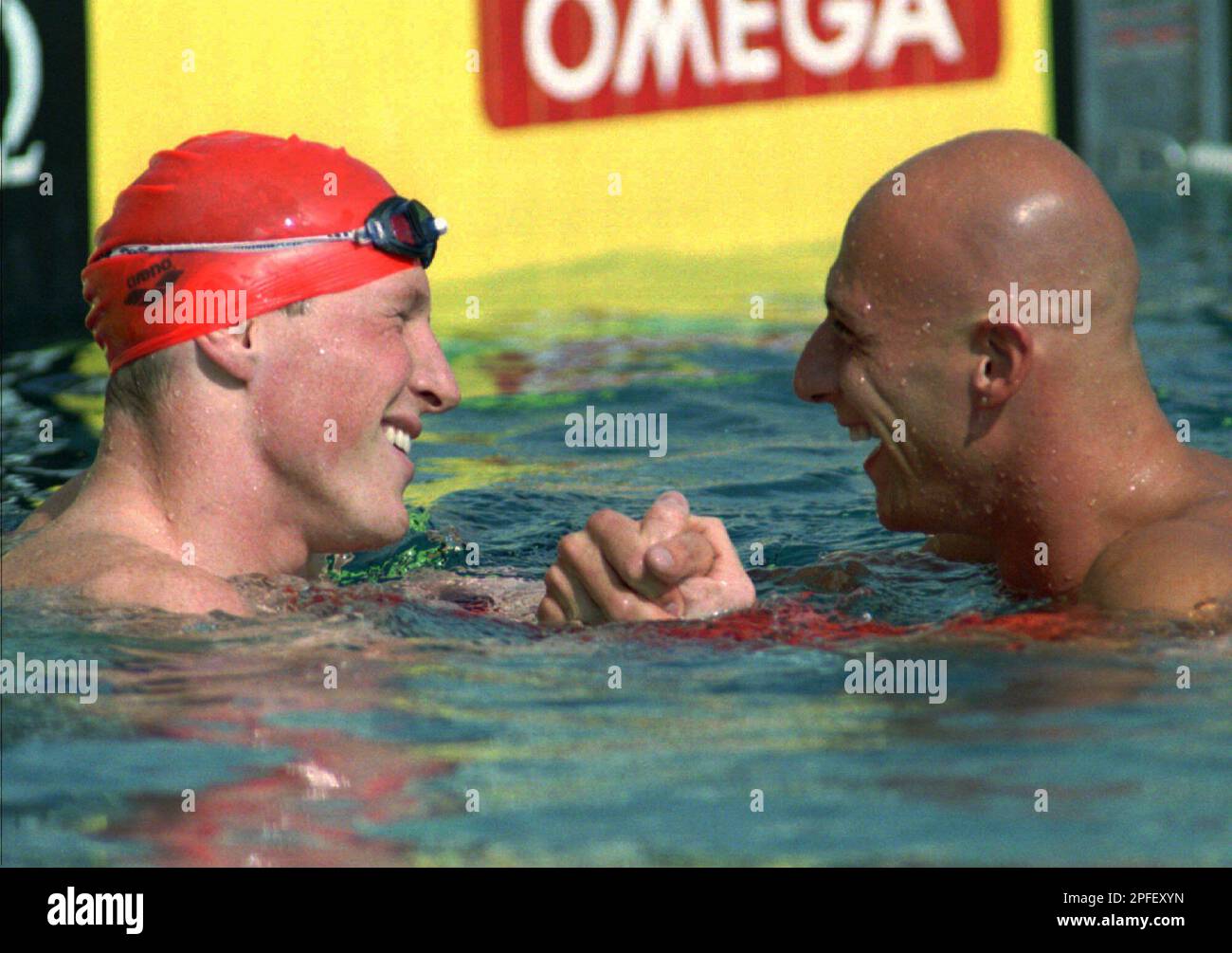 Italy's Luca Sacchi, right, congratulates Germany's Christian Keller ...