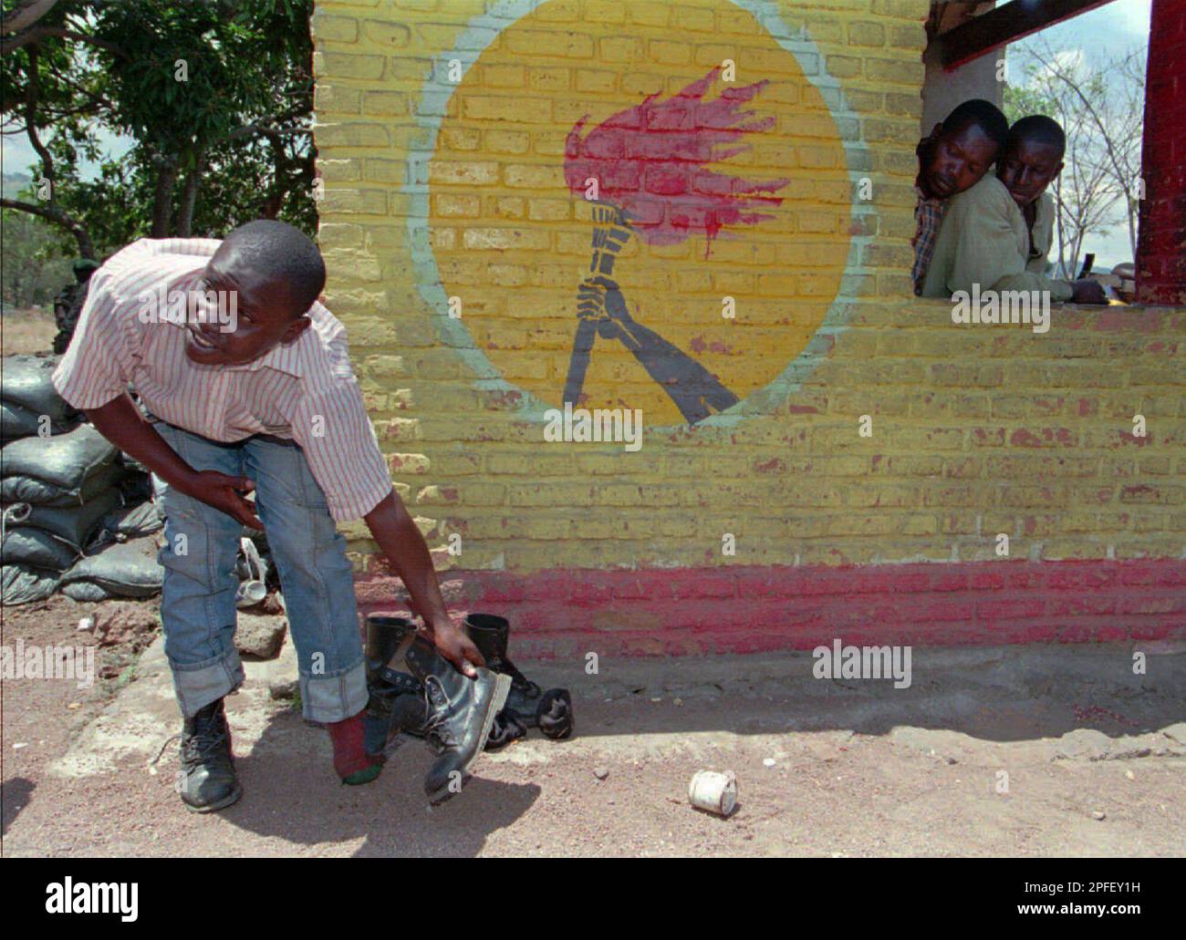 A Rwandan refugee, trying to hide his past as a member of the former ...