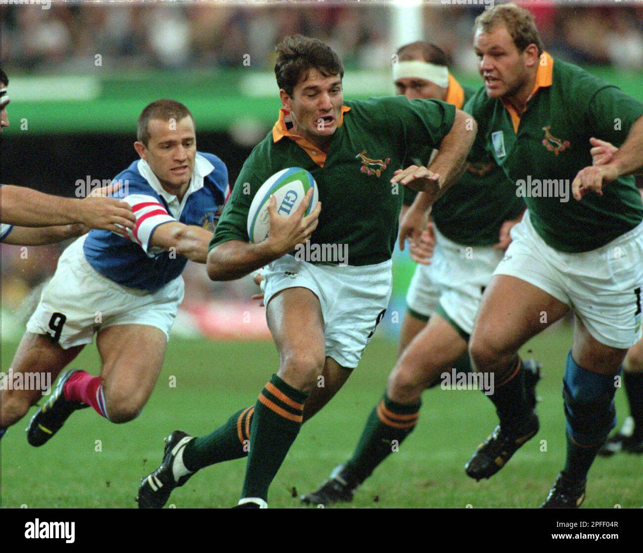 South Africa's scrum half Joost van der Westhuizen breaks around the ...