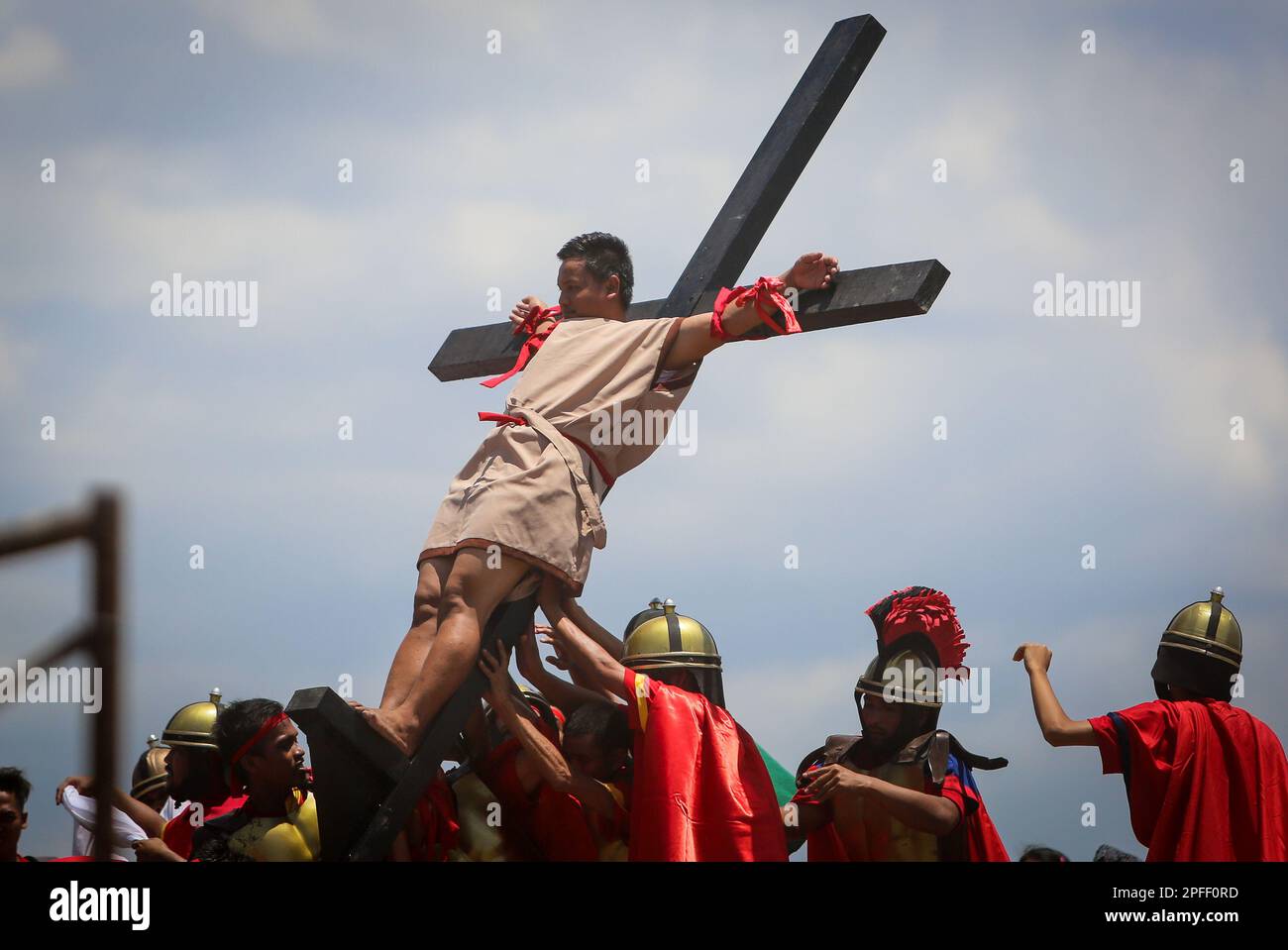 Real crucifixion and flagellants parade for Holy Week, Good Friday ...